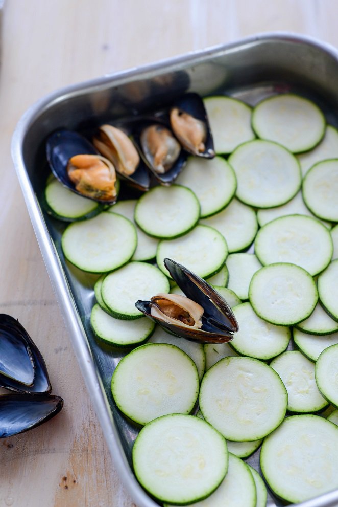 Überbackene Muscheln mit Persillade und Ziegenfrischkäse Rezept